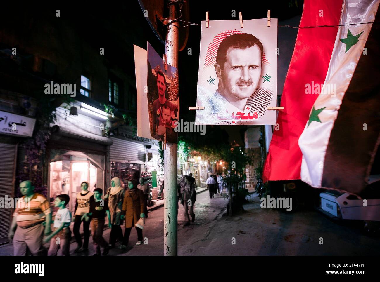 Pre-war Syria.A poster of Syrian president Bashar al-Assad hangs in ...