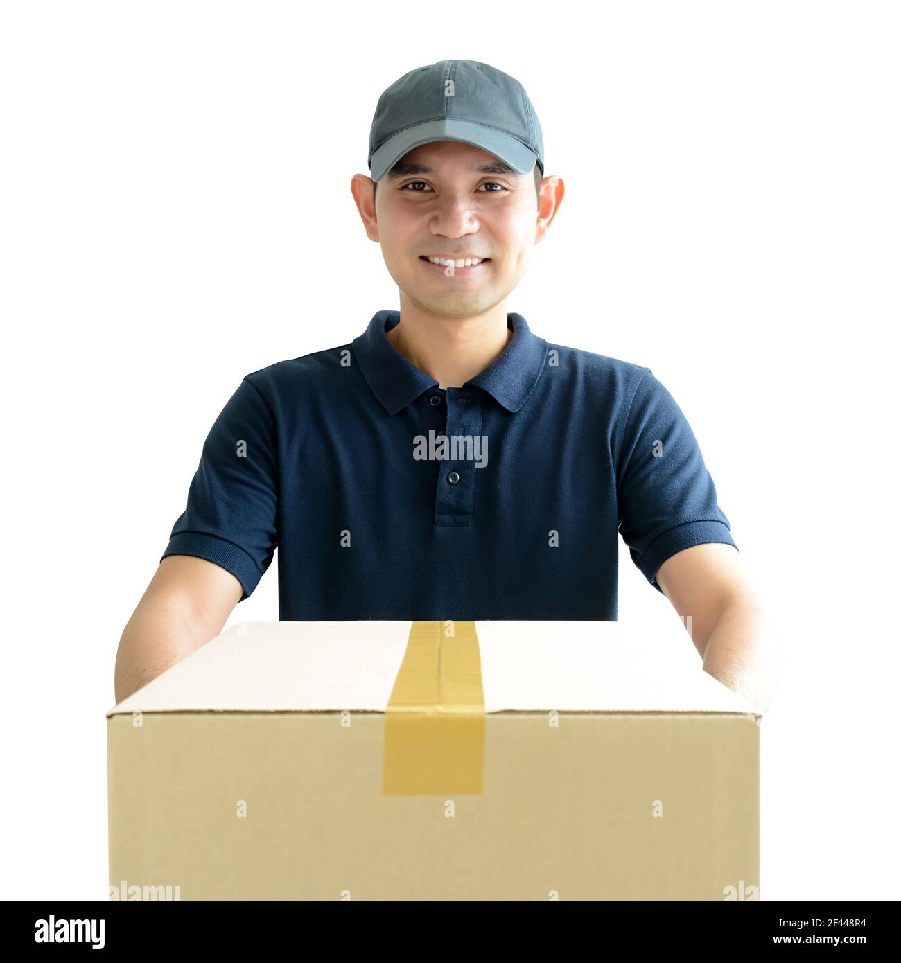 Deliveryman giving a cardboard parcel box Stock Photo - Alamy