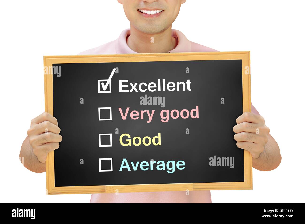 Tick mark in front of Excellent word on blackboard held by smiling man ...