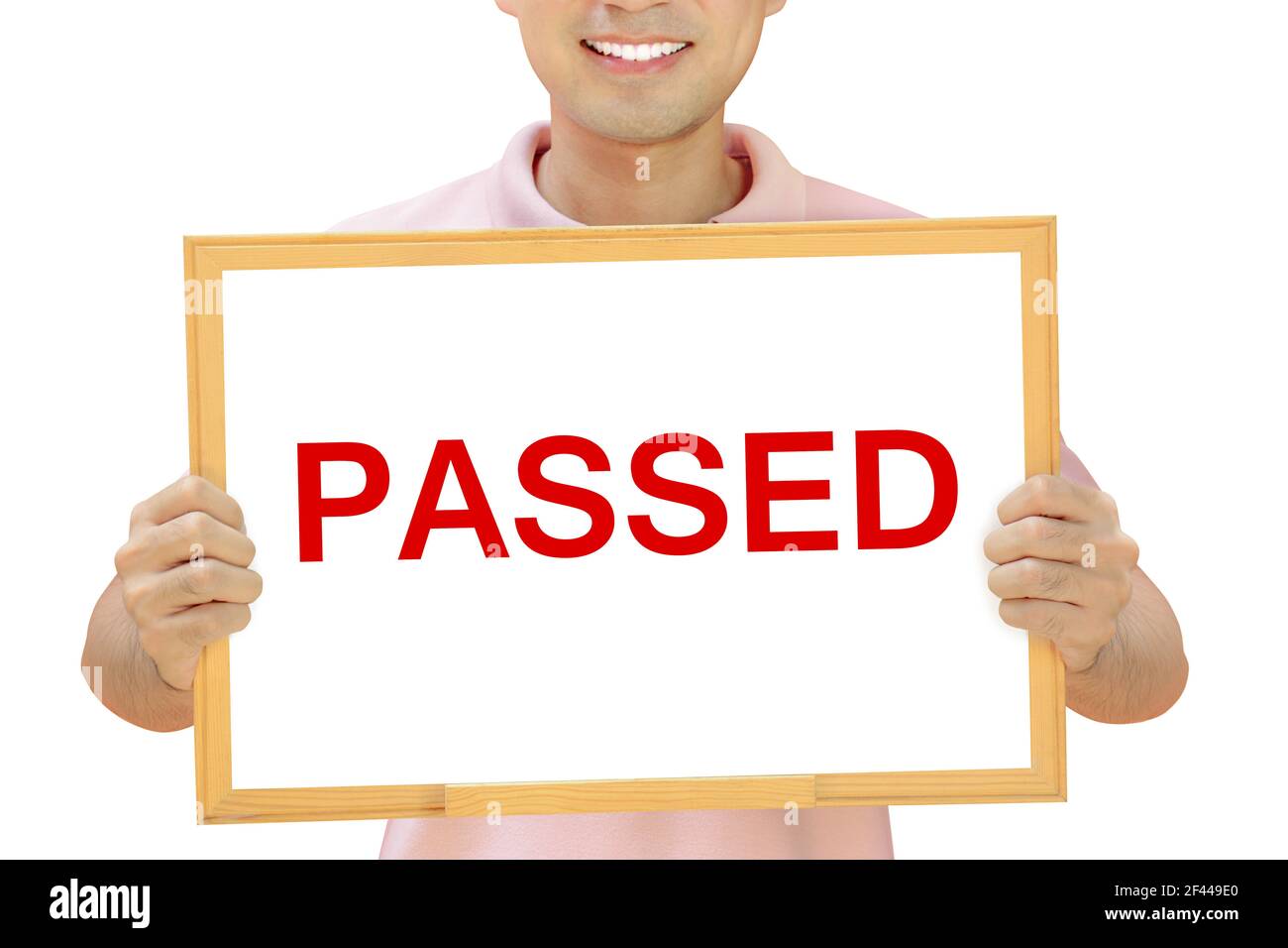 PASSED sign on whiteboard held by smiling man - examination ...