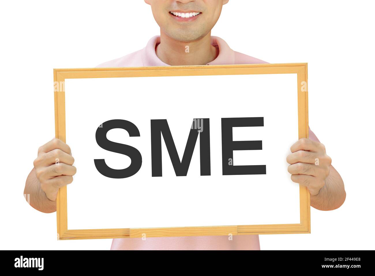 SME sign on whiteboard held by smiling man Stock Photo - Alamy