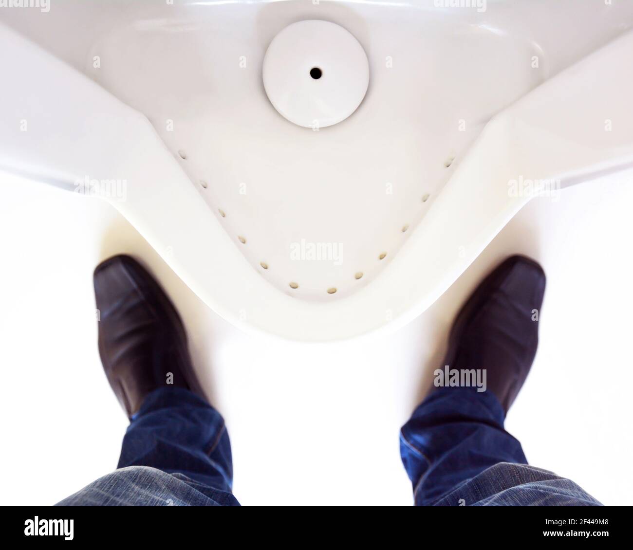 Top view of a man legs in front of urinal in men toilet Stock Photo - Alamy