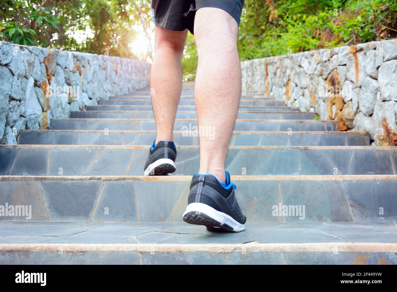 Man running up stairs hi-res stock photography and images - Alamy