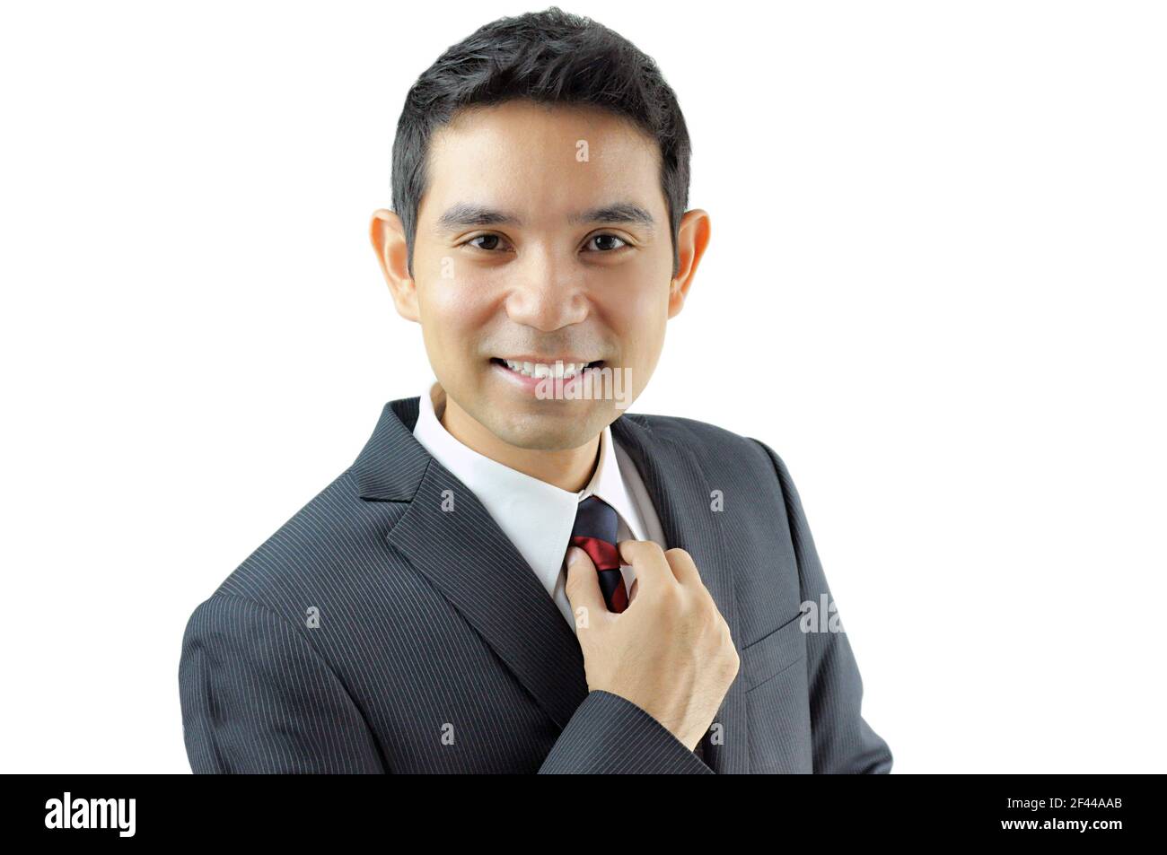 Young Asian businessman smiling (Thai man Stock Photo - Alamy