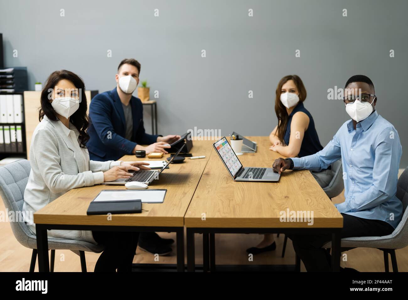 Diverse Group Staff In Face Mask Video Conferencing Stock Photo - Alamy