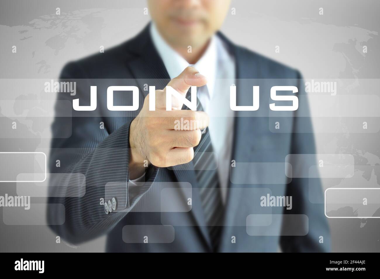 Businessman pointing to JOIN US sign on virtual screen Stock Photo - Alamy