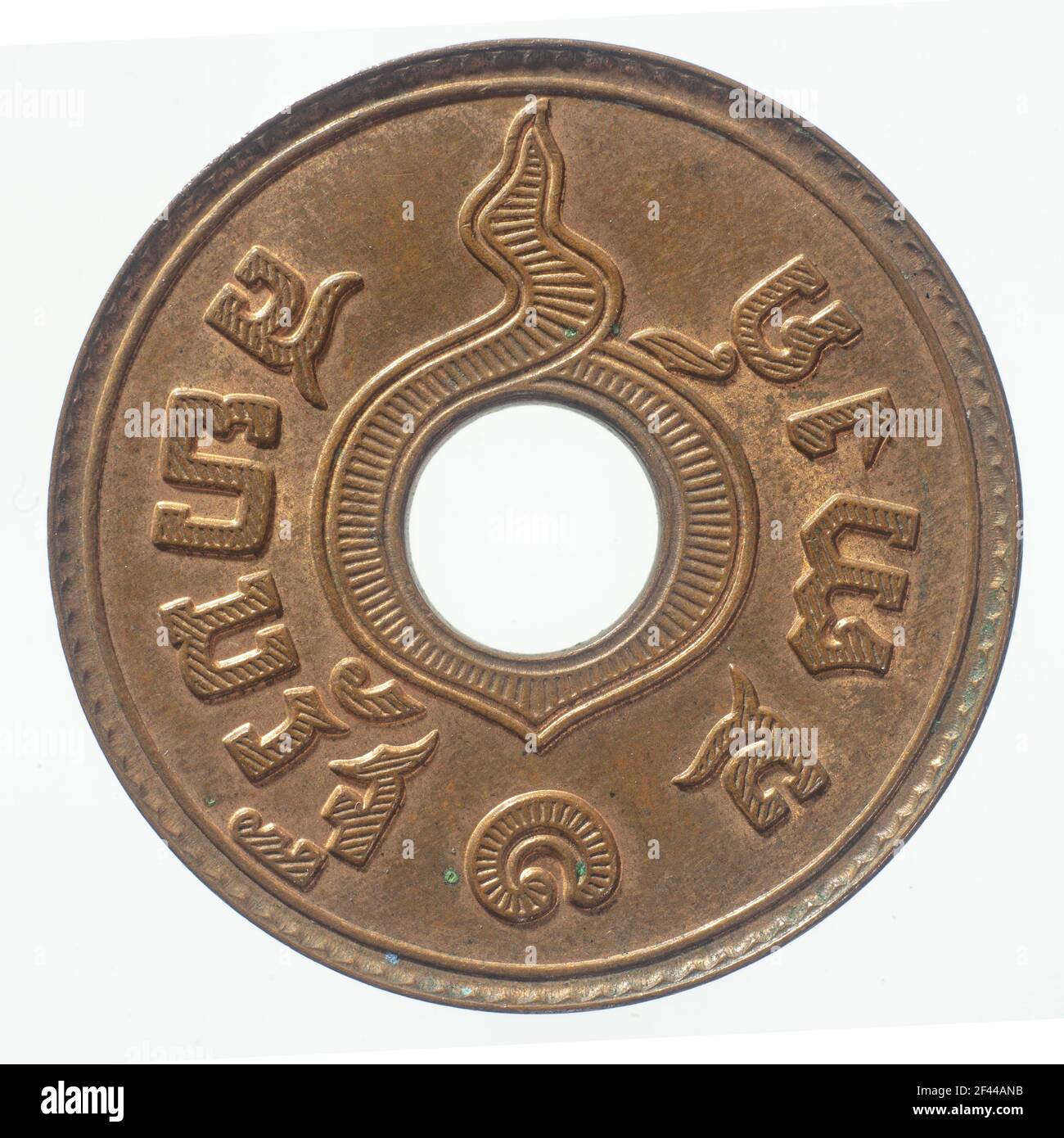 isolated of 1 satang old Thai coin on white background. In the reign of ...