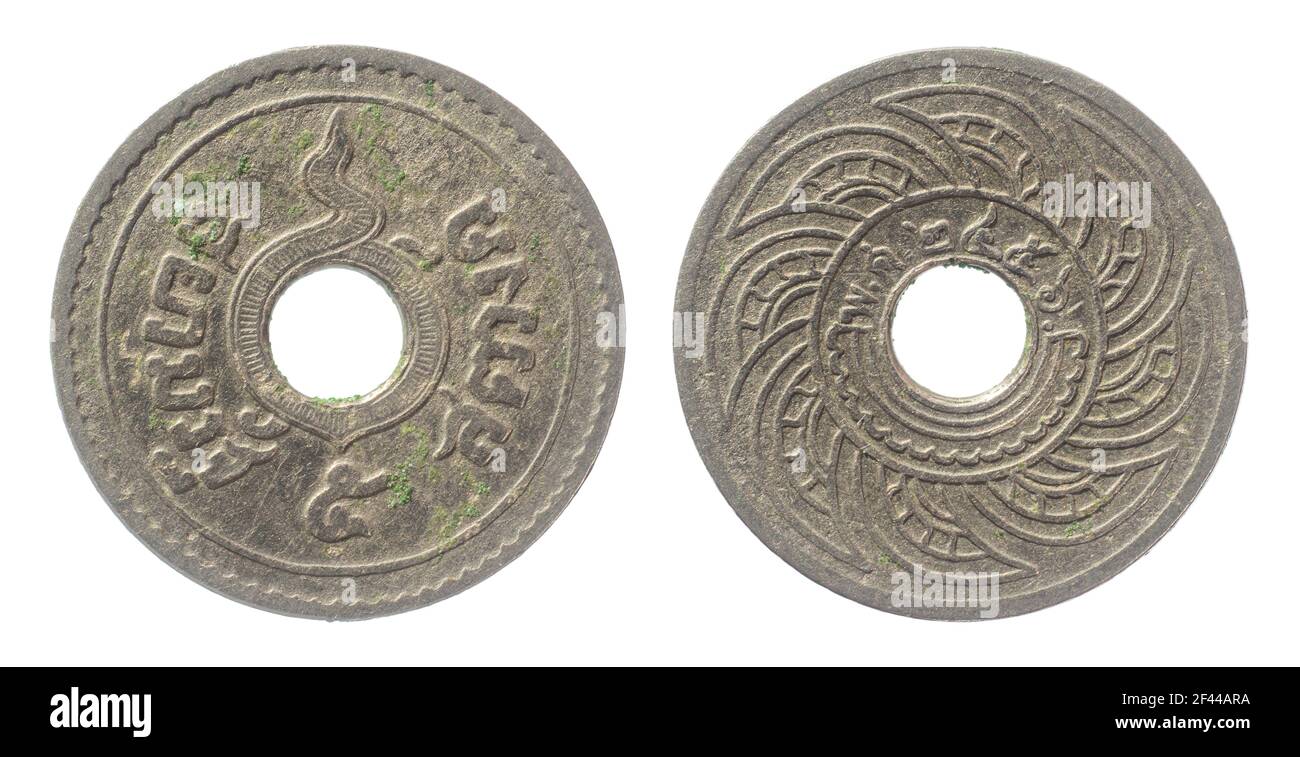 isolated of 1913 old Thai coin on white background. In the reign of ...