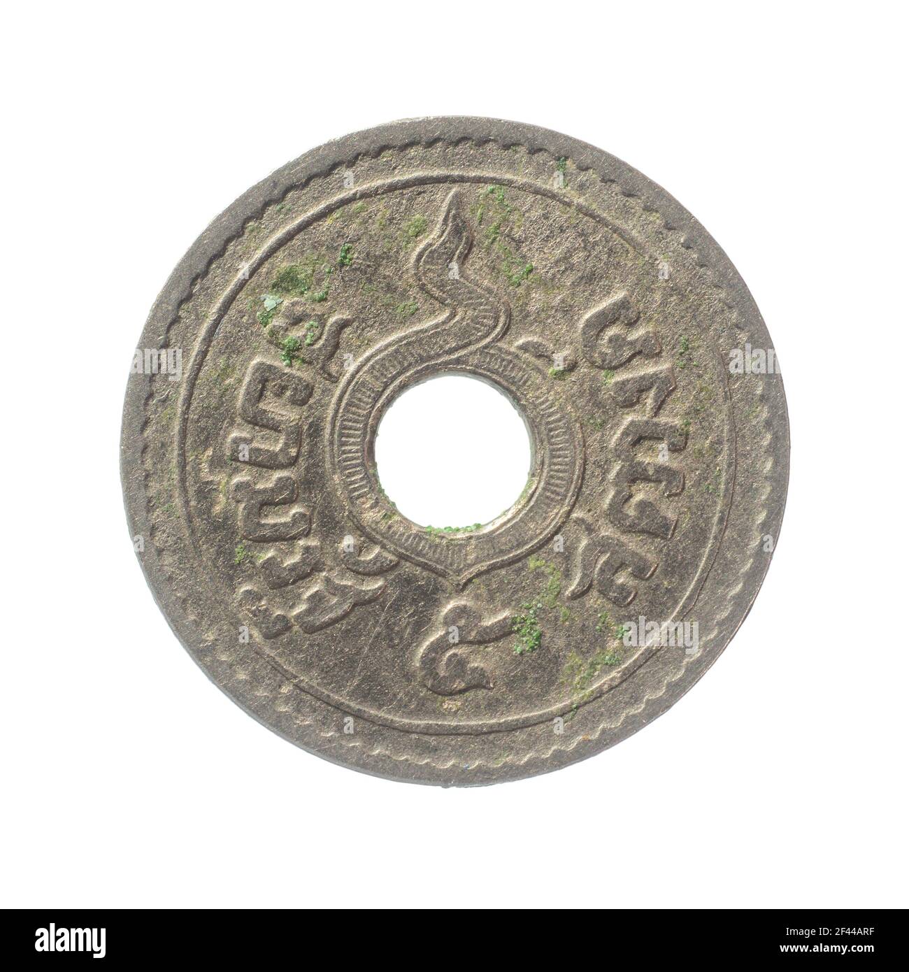 isolated of 1913 old Thai coin on white background. In the reign of ...