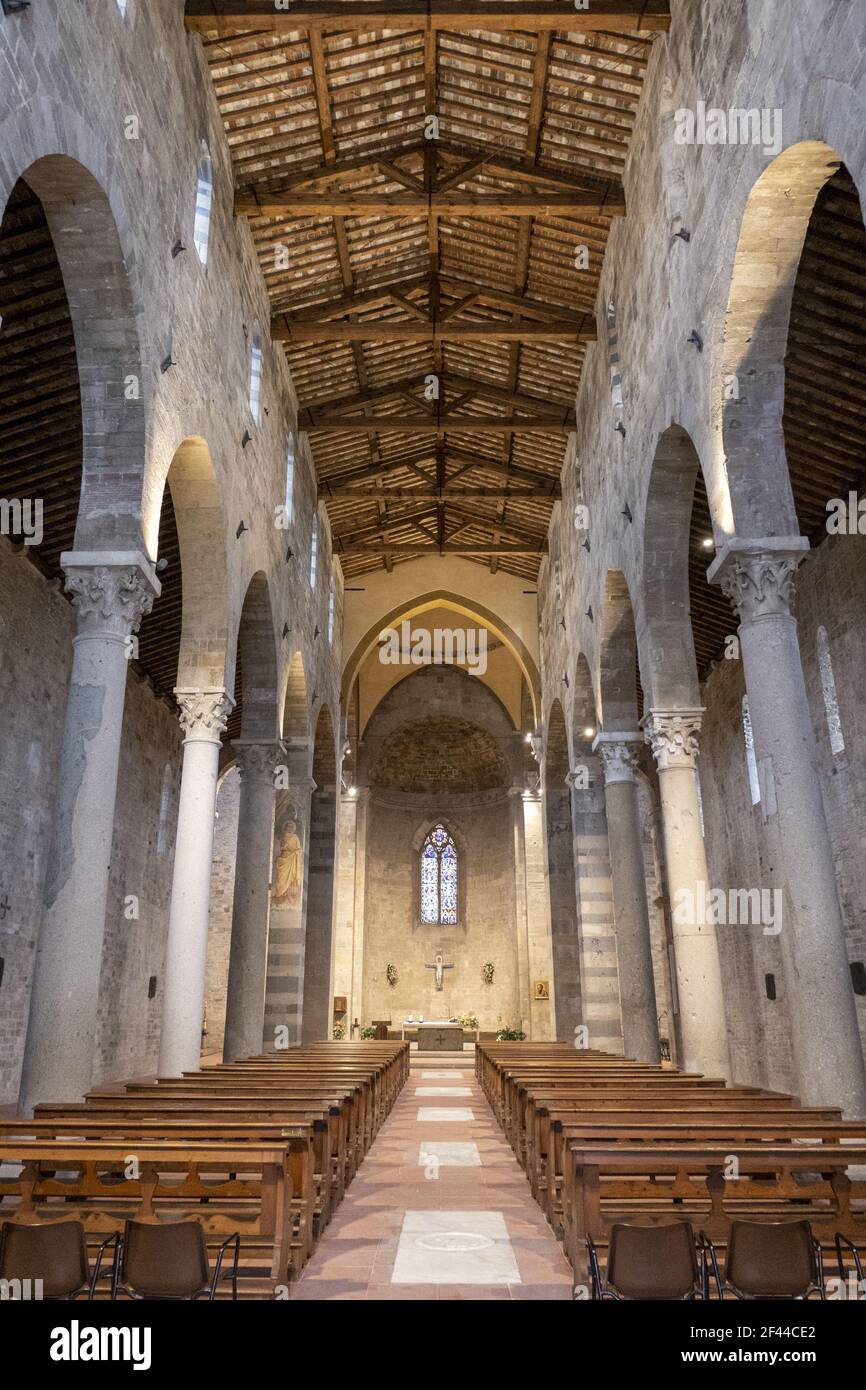A beautiful simple sunny nave of the Roman Catholic church in the city ...