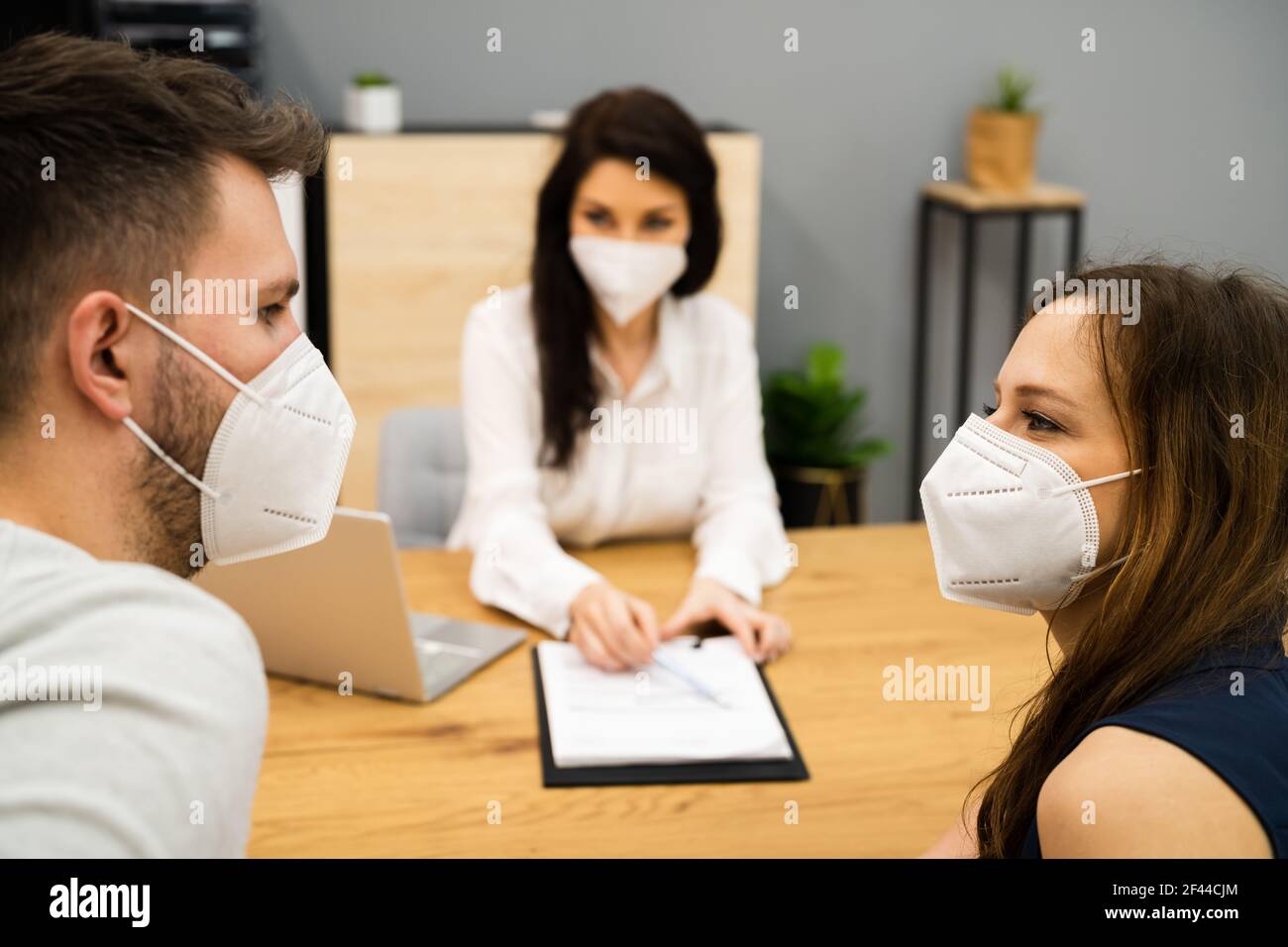 Insurance Agent Or Lawyer Wearing Face Mask With Client Or Customer ...