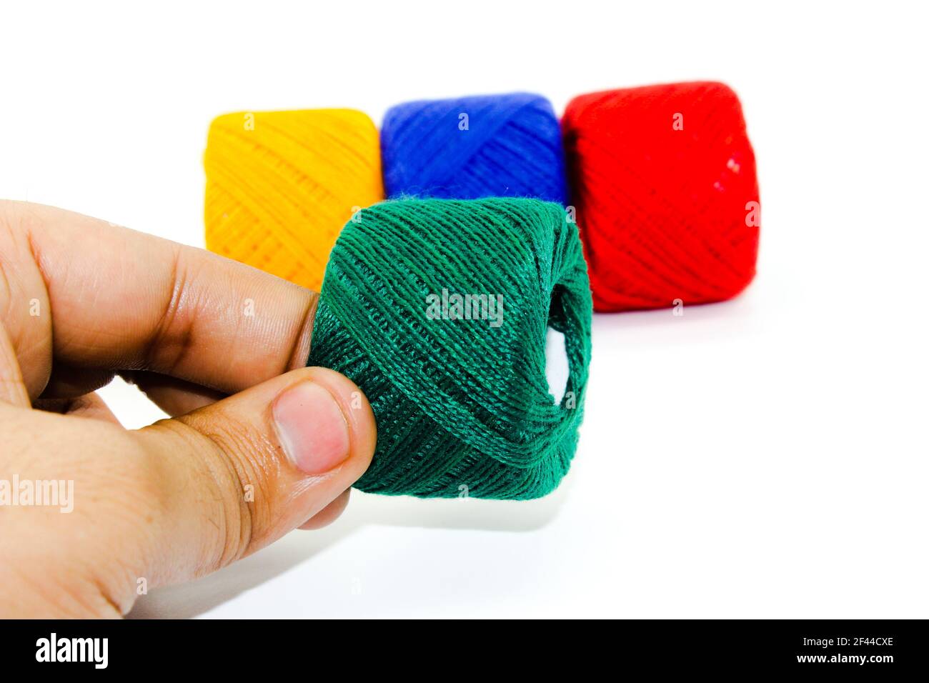 A picture of thread spools isolated on white background Stock Photo - Alamy