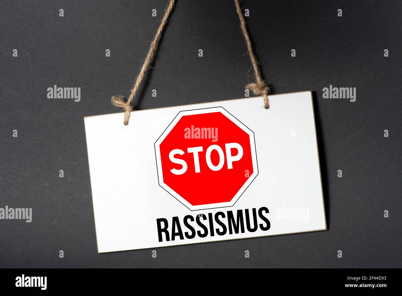 A sign stop racism Stock Photo - Alamy