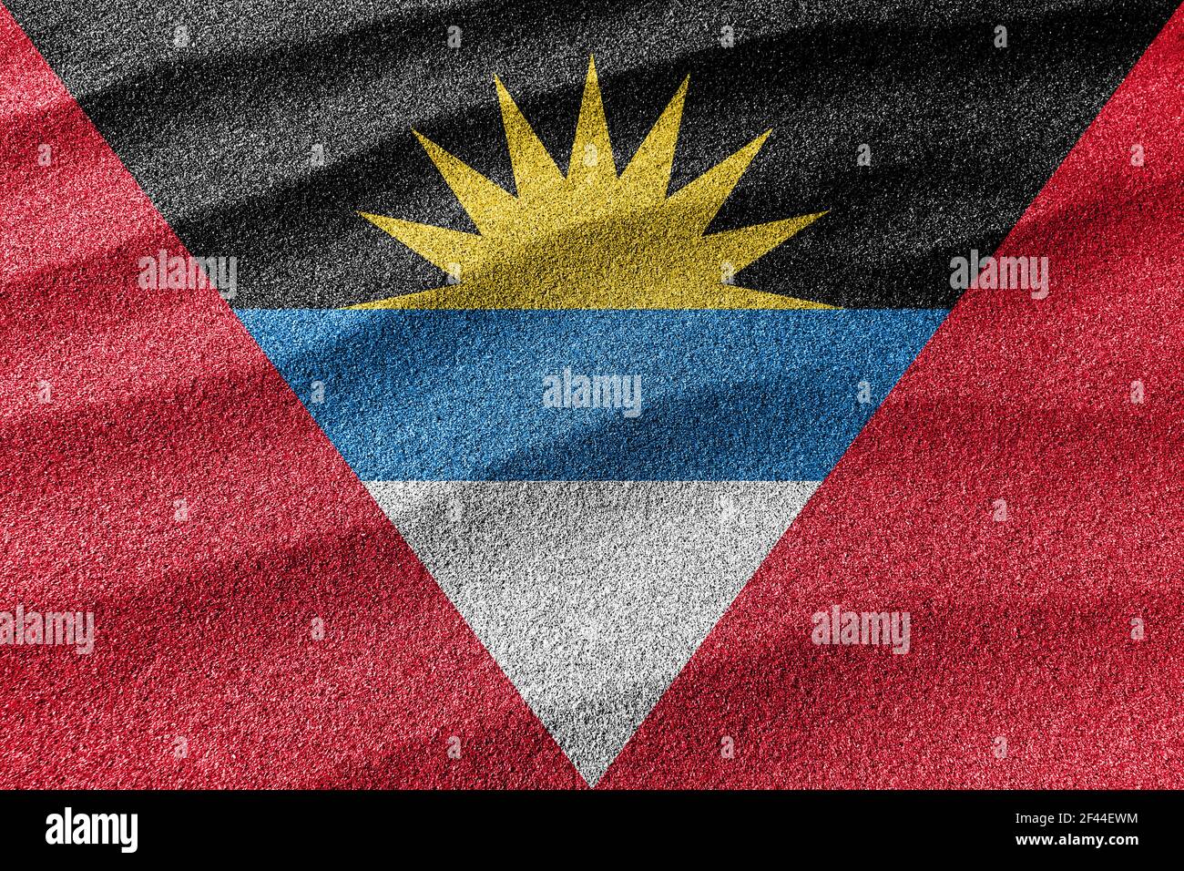 Antigua and Barbuda sand flag, national flag sand background Stock ...