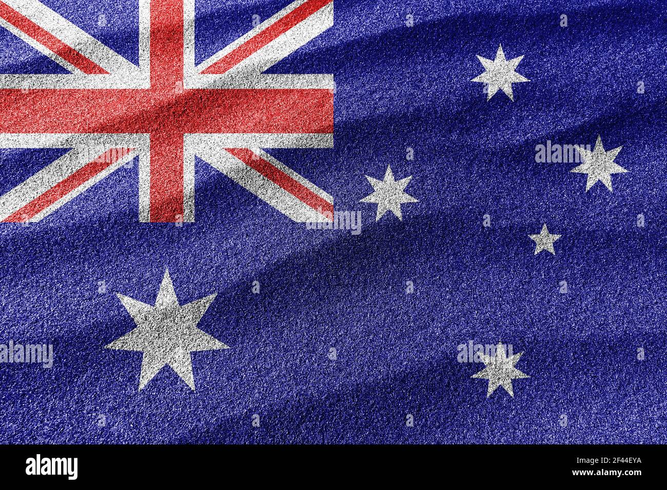 Australia sand flag, national flag sand background Stock Photo - Alamy