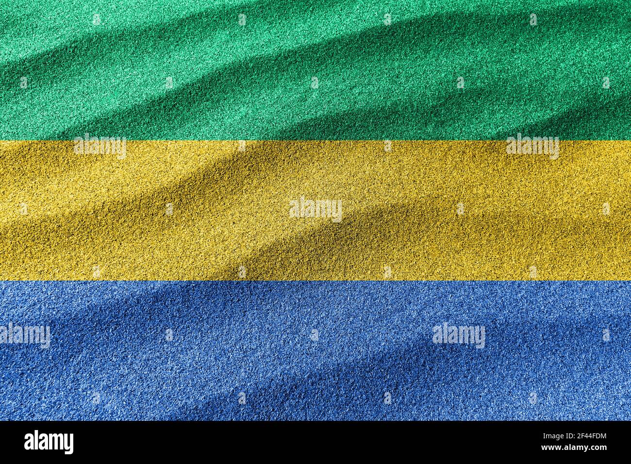 Gabon sand flag, national flag sand background Stock Photo - Alamy
