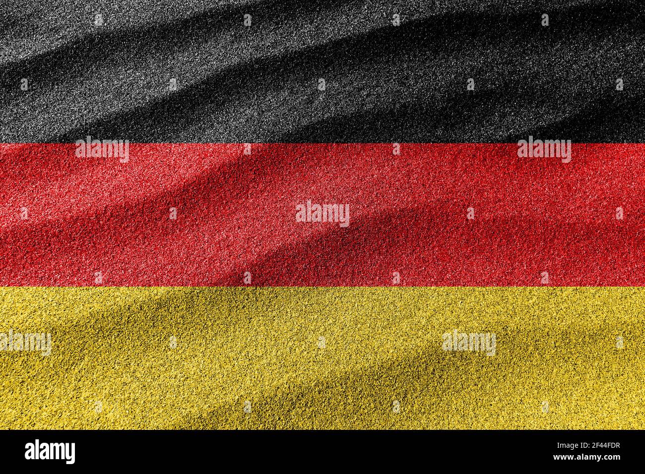Germany sand flag, national flag sand background Stock Photo - Alamy