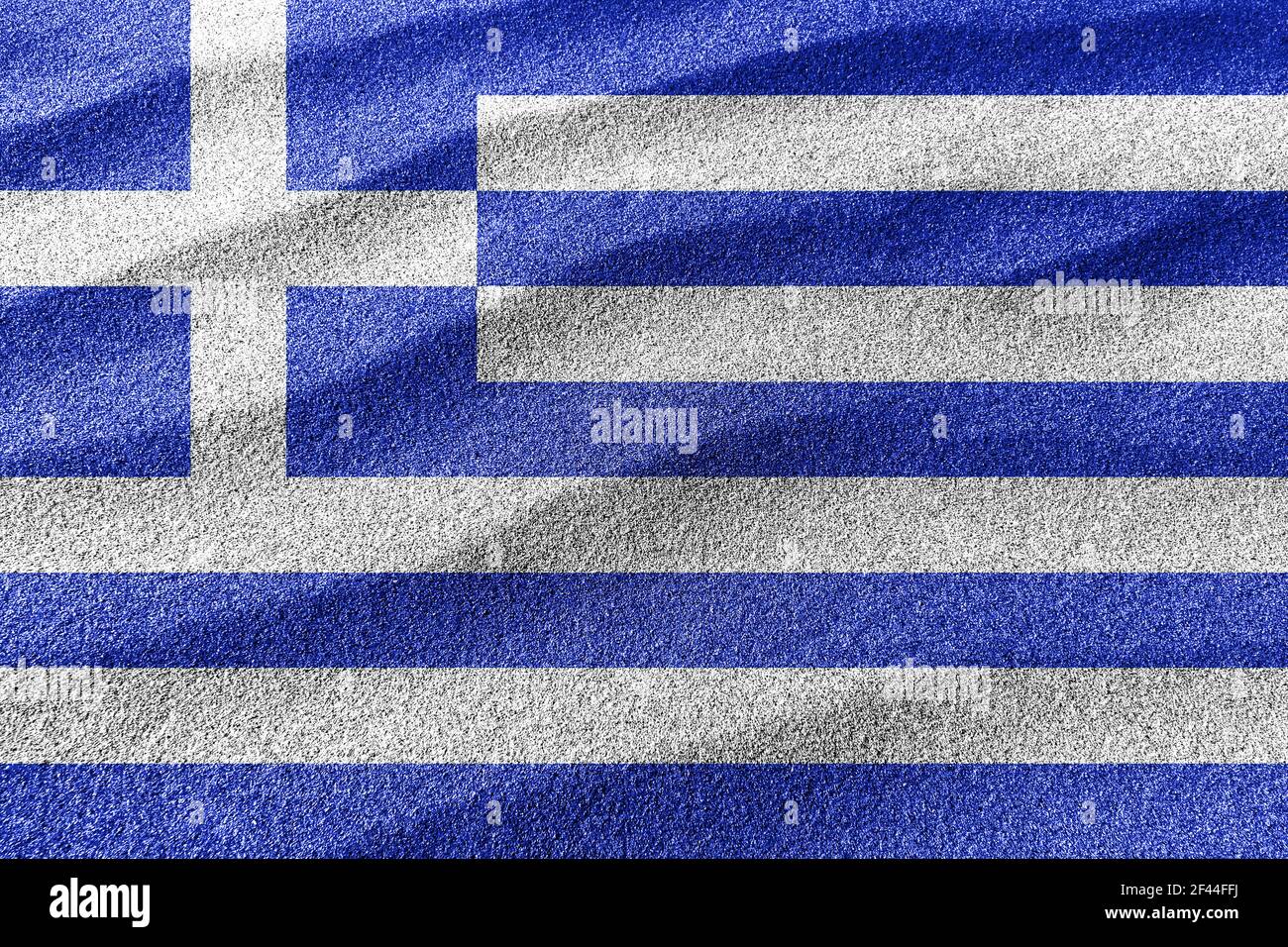 Greece sand flag, national flag sand background Stock Photo - Alamy
