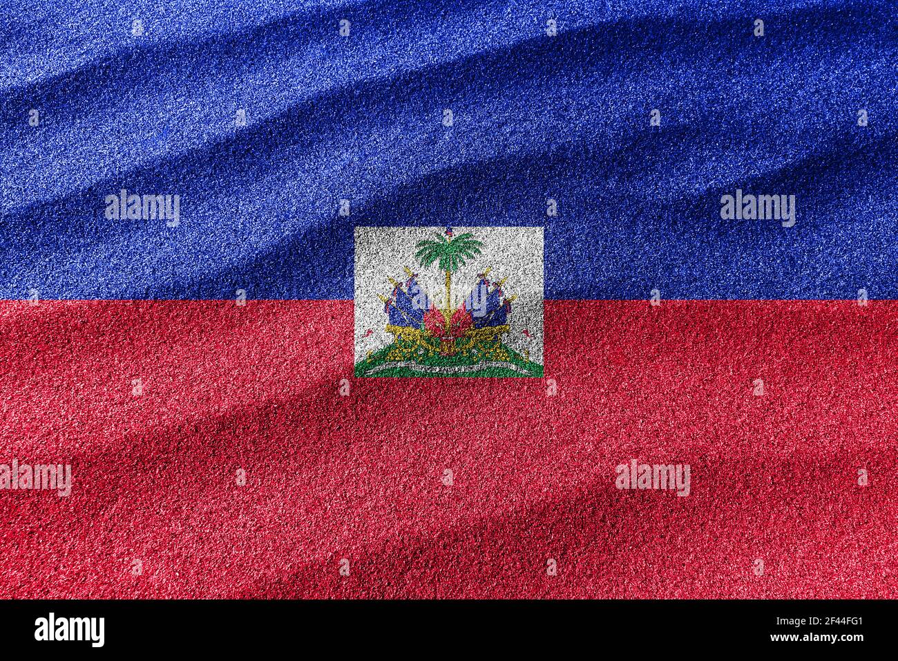 Haiti sand flag, national flag sand background Stock Photo - Alamy