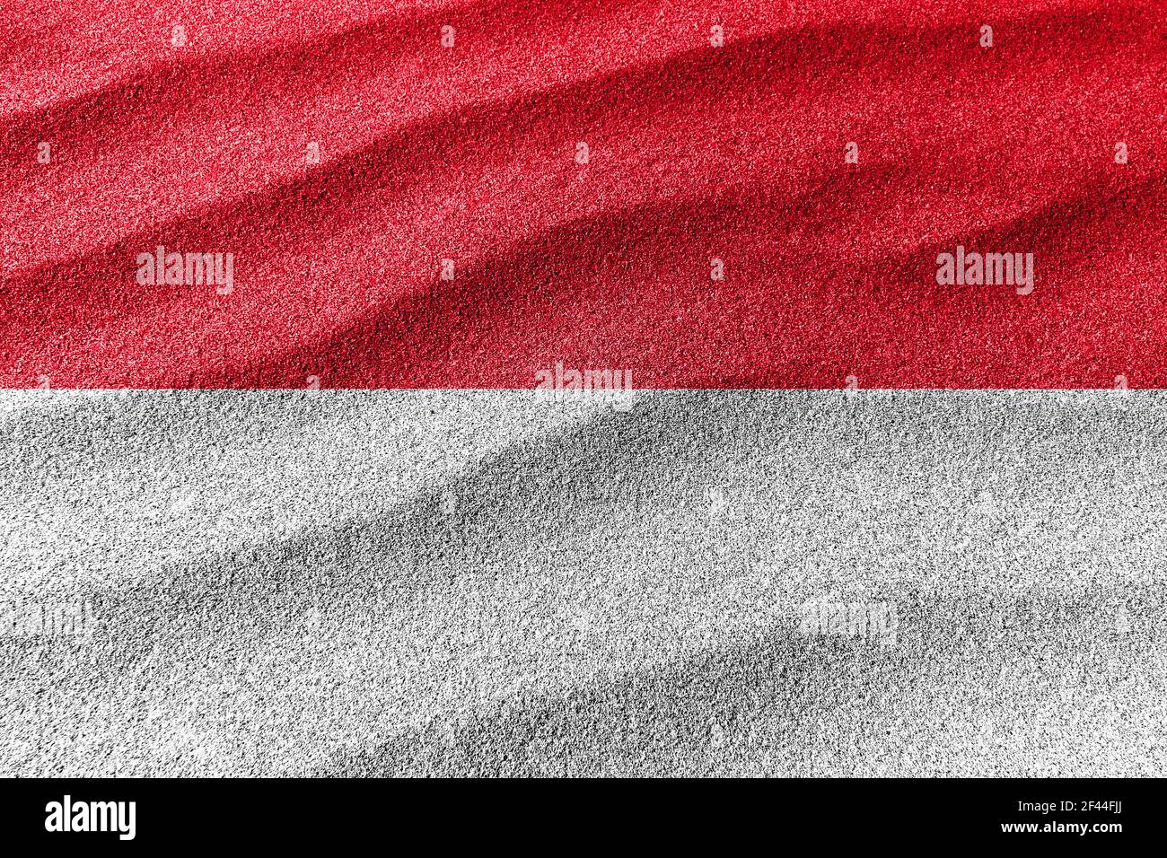 Indonesia sand flag, national flag sand background Stock Photo - Alamy