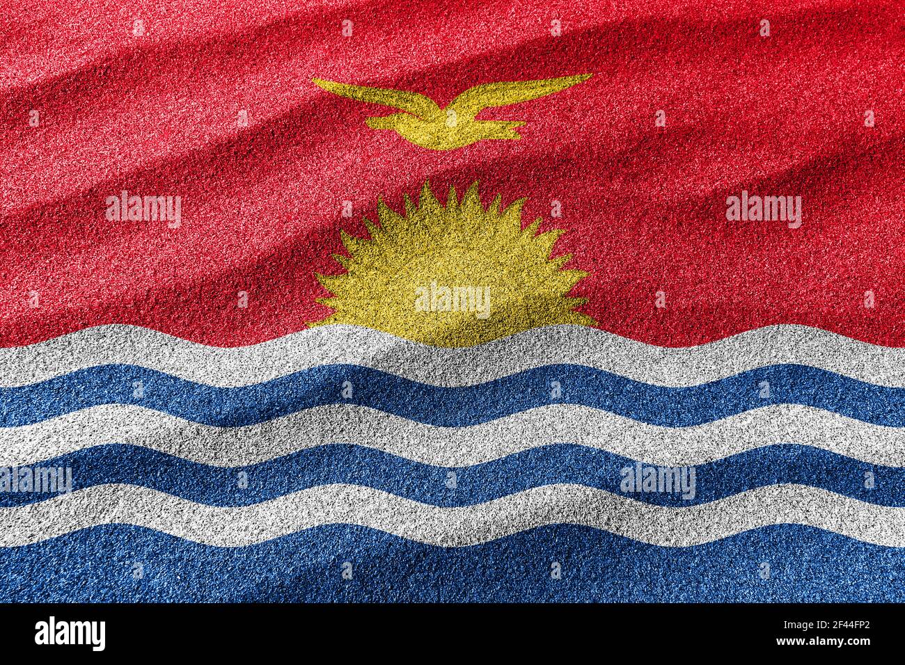Kiribati sand flag, national flag sand background Stock Photo - Alamy