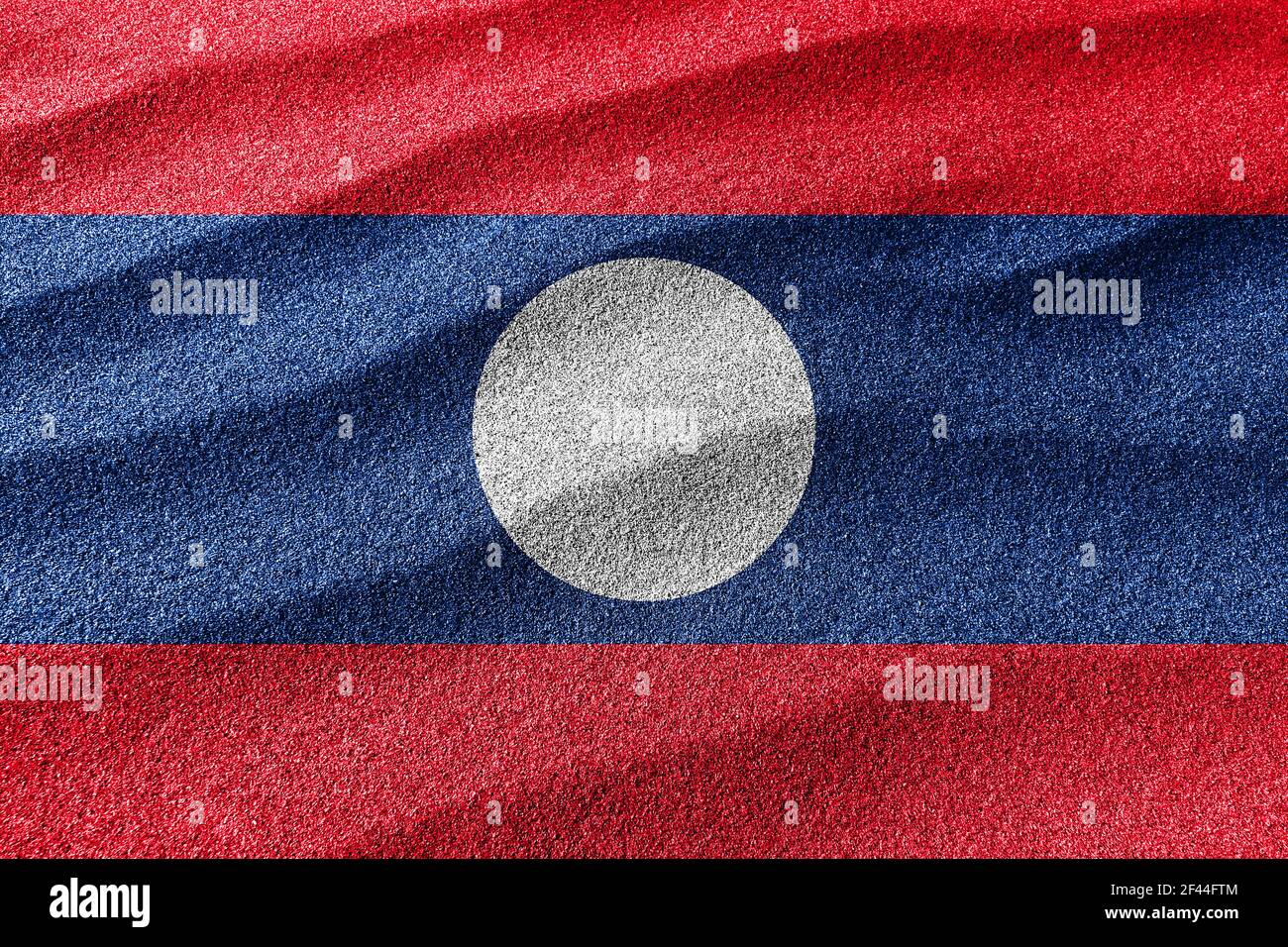 Laos sand flag, national flag sand background Stock Photo - Alamy