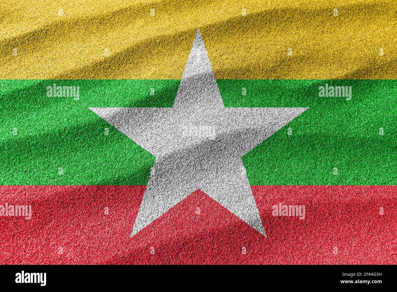 Myanmar sand flag, national flag sand background Stock Photo - Alamy
