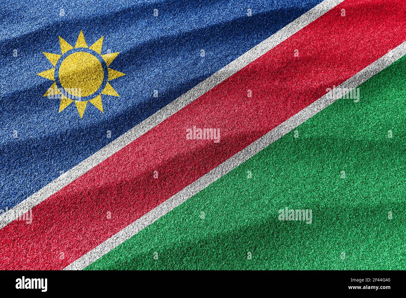 Namibia sand flag, national flag sand background Stock Photo - Alamy