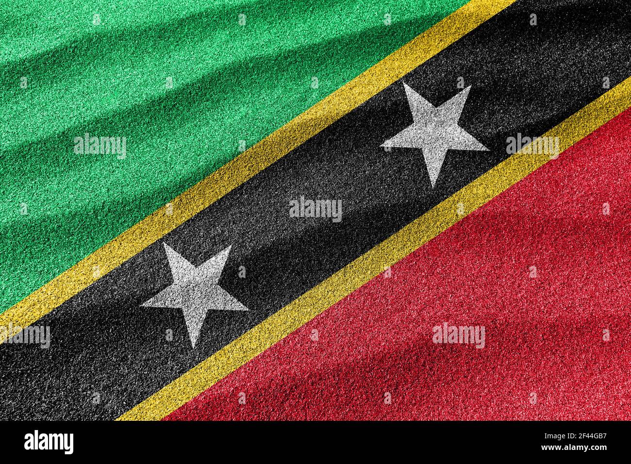 Saint Kitts and Nevis sand flag, national flag sand background Stock ...