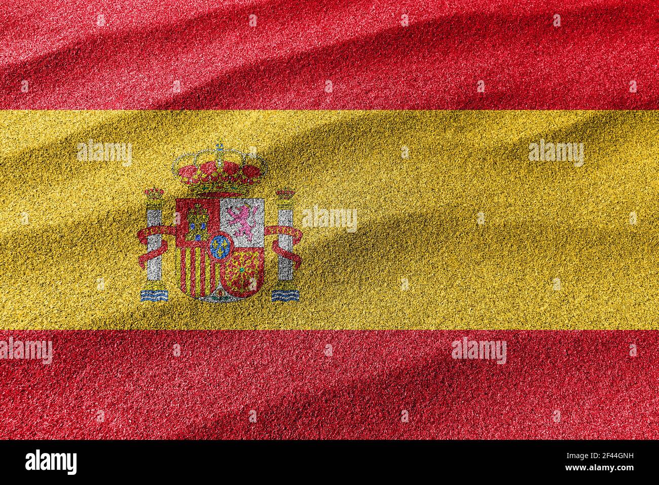 Spain sand flag, national flag sand background Stock Photo - Alamy