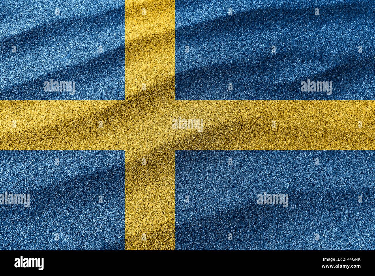 Sweden sand flag, national flag sand background Stock Photo - Alamy