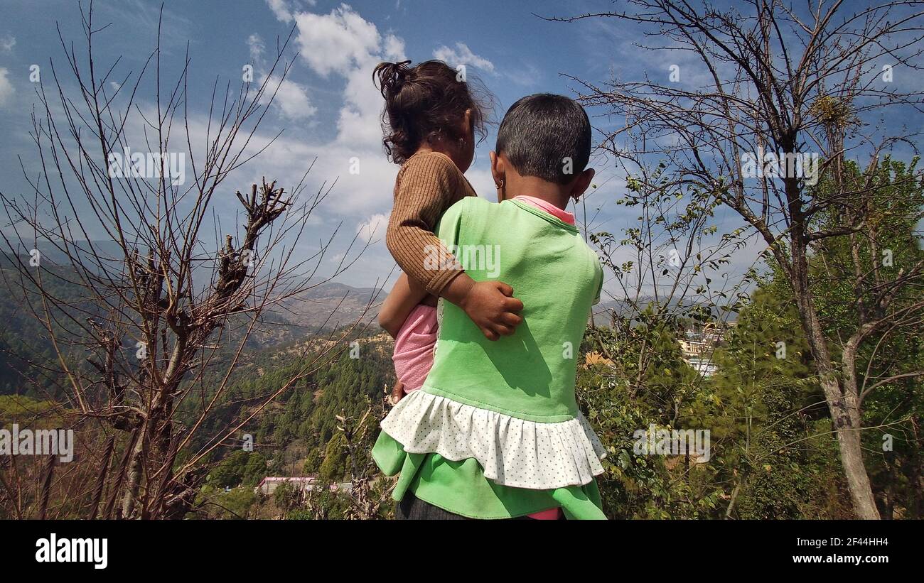 A back view of children outdoors at springtime Stock Photo - Alamy