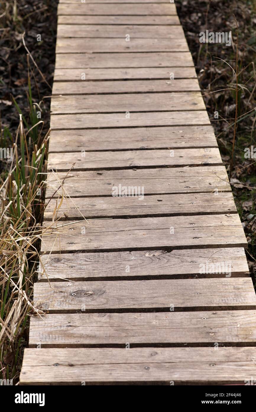 Wooden footbridge wooden path bridge Stock Photo - Alamy