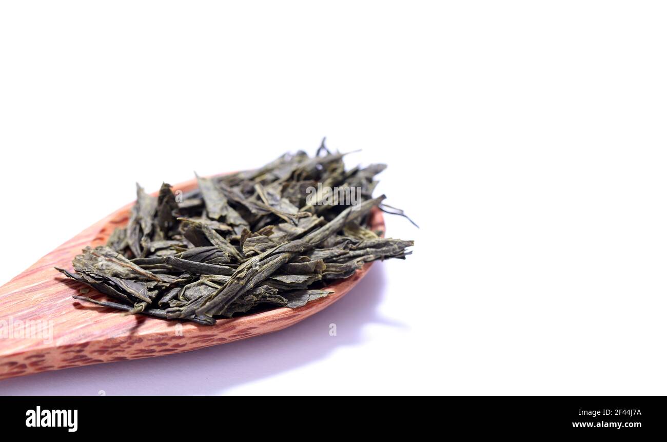 Green tea dried and with rolled leaves Stock Photo - Alamy