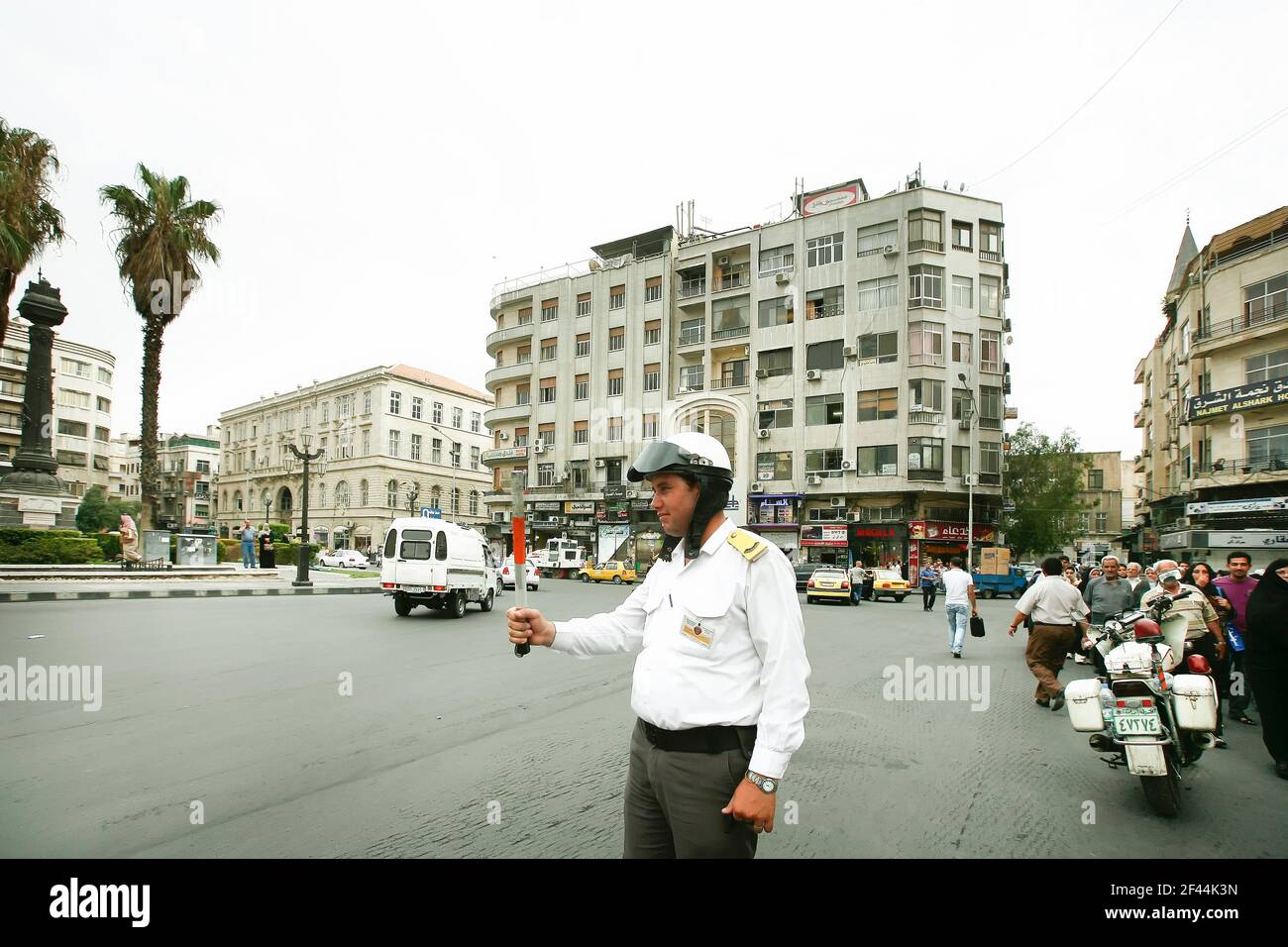 Damascus,Syria - August 03,2010 : A Syrian police officer carries out ...