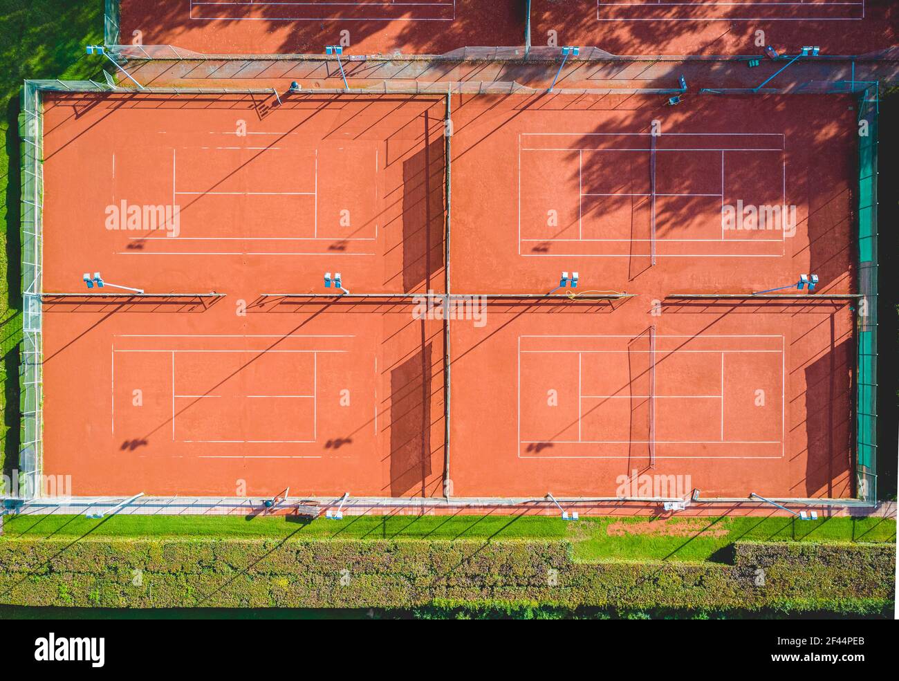 Aerial view of red clay tennis court Stock Photo - Alamy