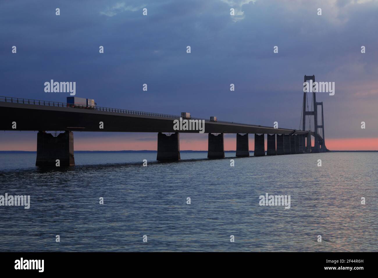 Storebæltsbroen bridge. The sun is setting Stock Photo - Alamy