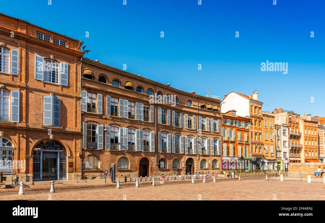 Facades of buildings in the Saint-Etienne district in Toulouse in ...