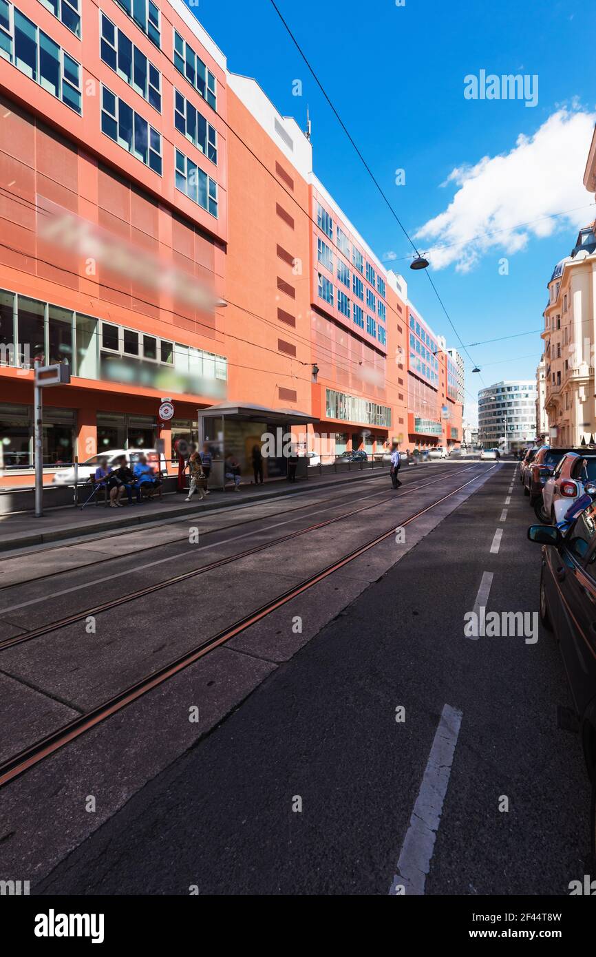 Glimpse of modern orange building in Wien Stock Photo - Alamy