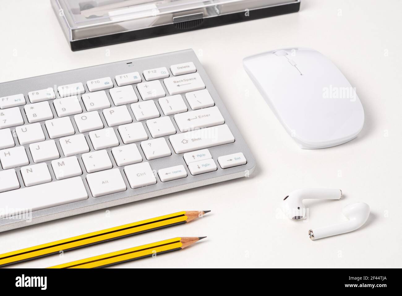 View of keyboard and mouse of a modern computer with pencils Stock ...