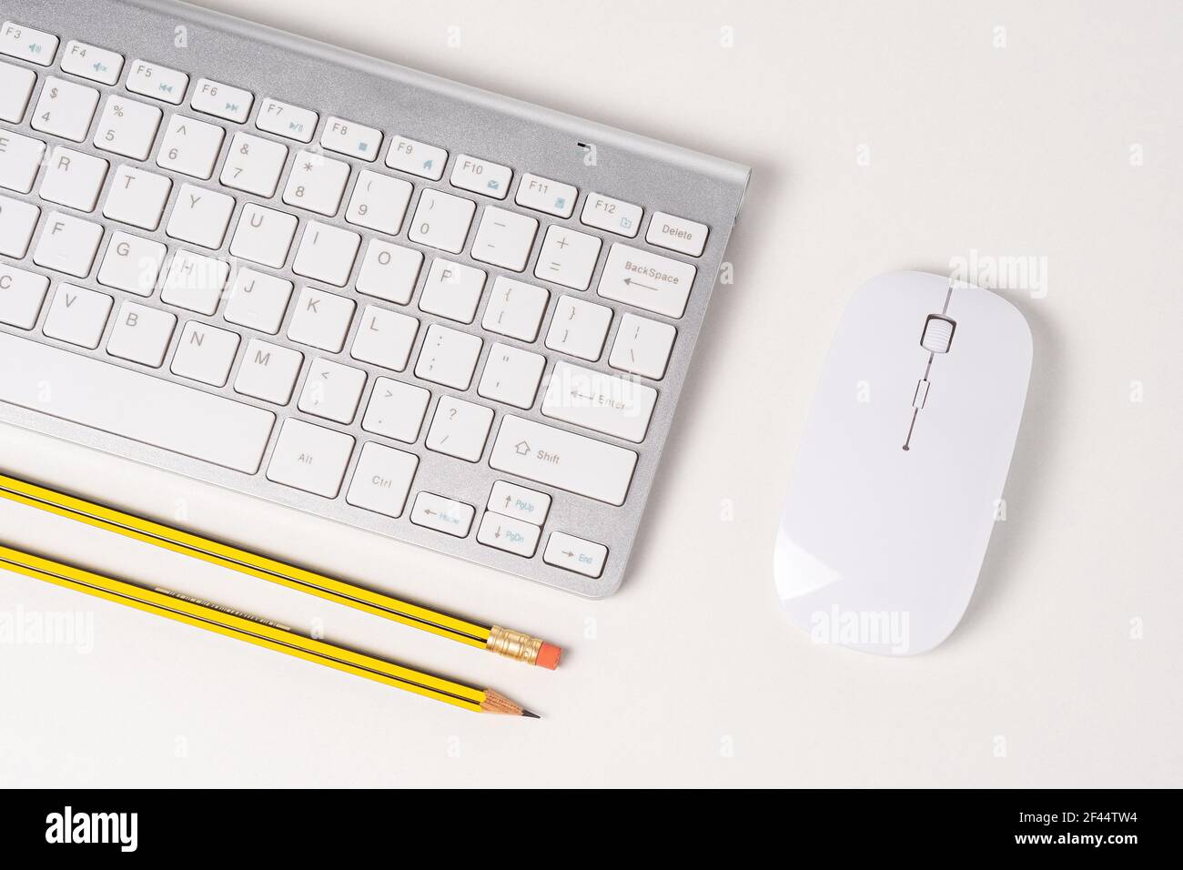 View of keyboard and mouse of a modern computer with pencils Stock ...