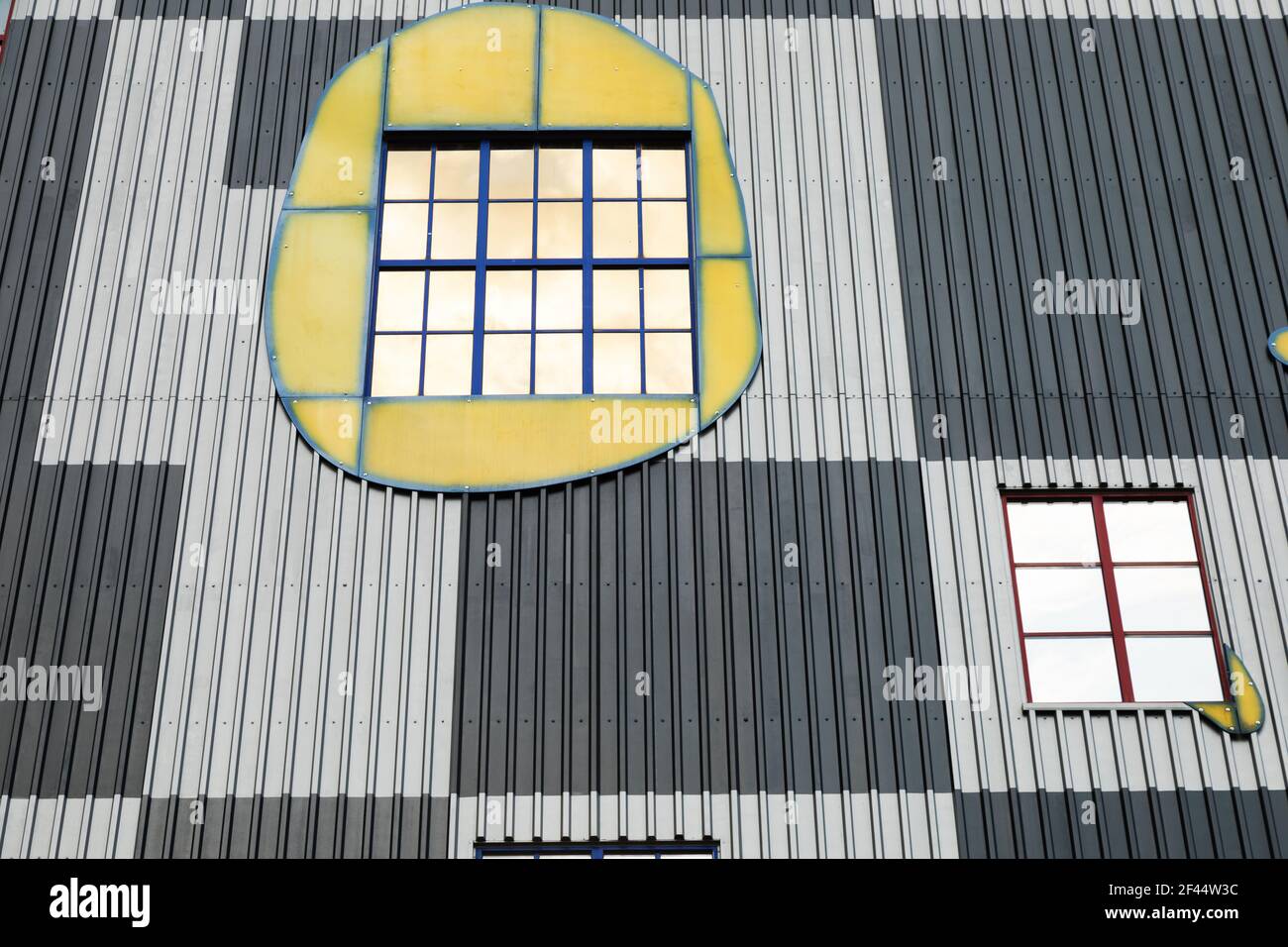 Artistic window in strange white and black building Stock Photo - Alamy