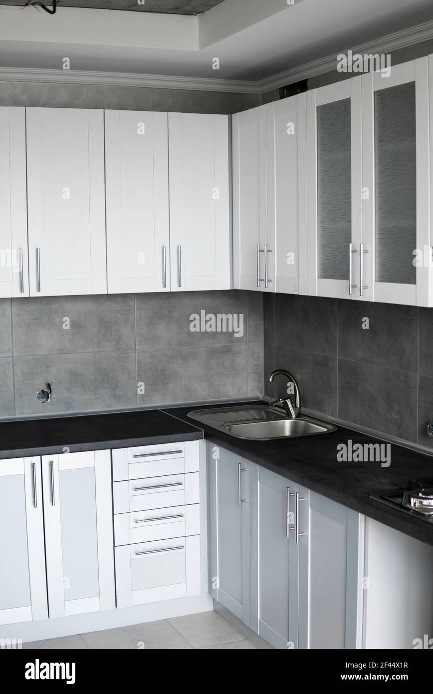 Modern minimalism style kitchen interior in monochrome tones. Custom ...