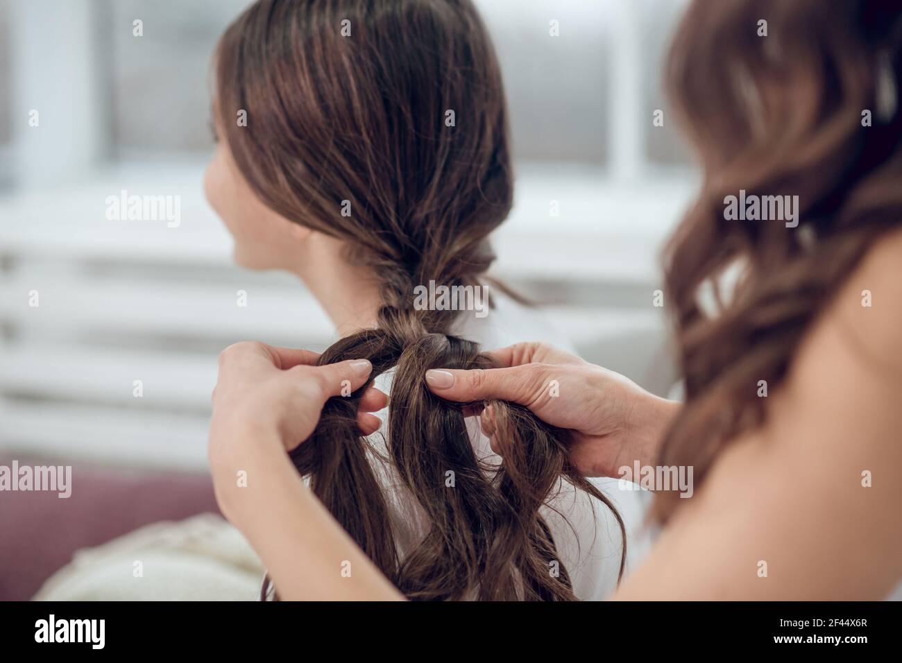 Pigtail braiding woman hi-res stock photography and images - Alamy