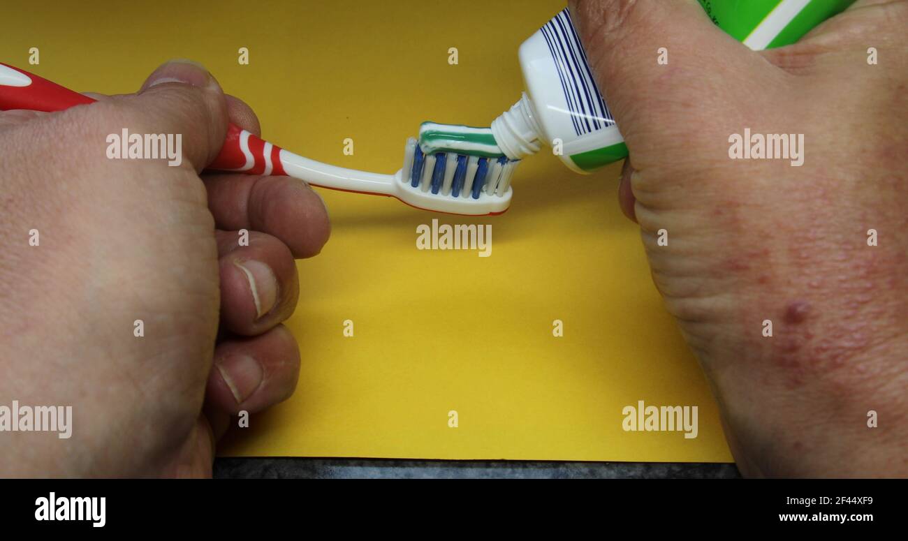 Toothpaste is applied to a toothbrush to brush your teeth Stock Photo ...