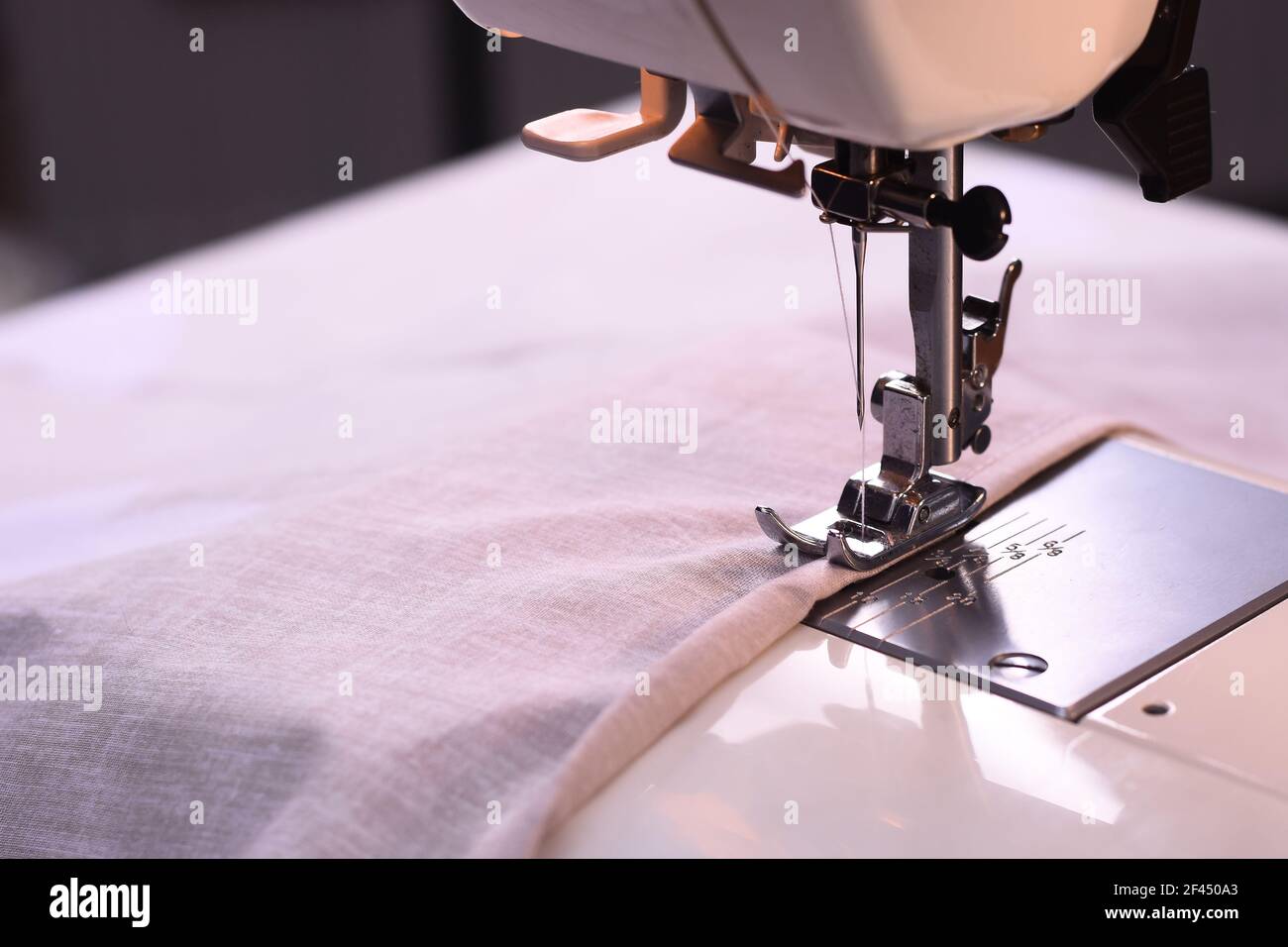 The process of sewing on a sewing machine Stock Photo - Alamy