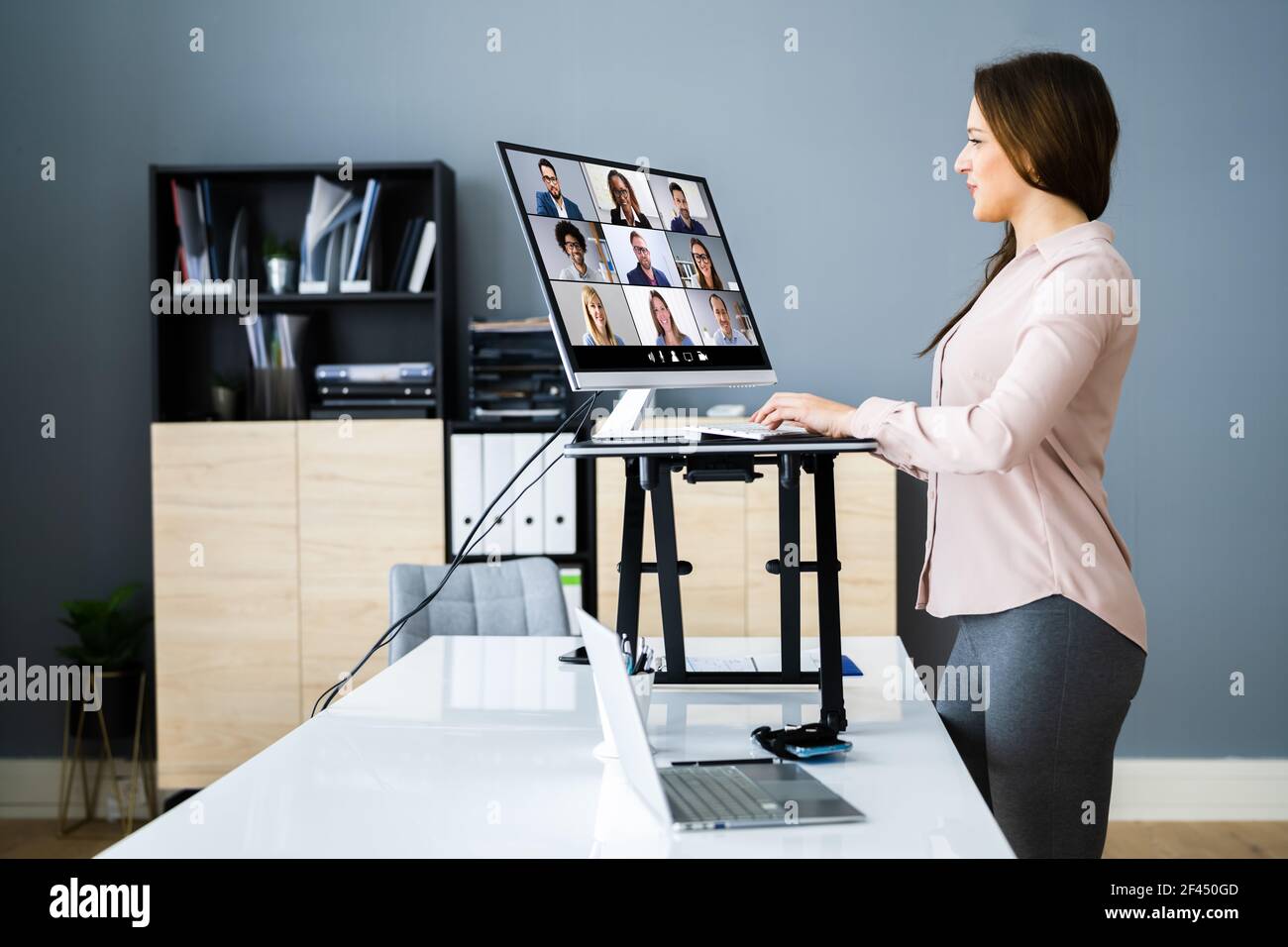 Back view girl desktop computer hi-res stock photography and images - Alamy