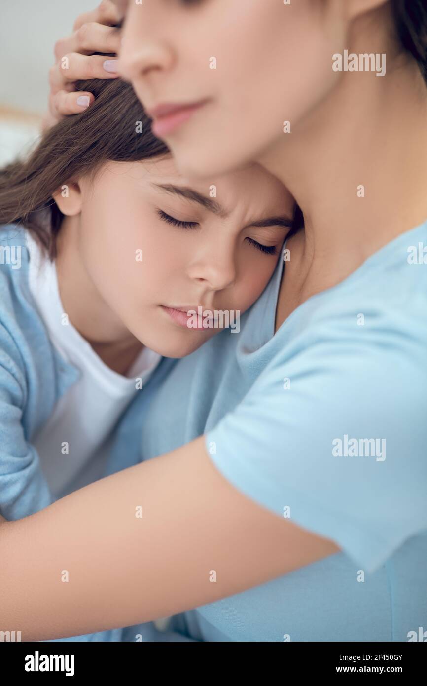 Snuggling moment hi-res stock photography and images - Alamy
