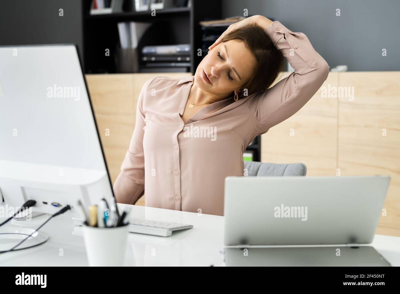 Stretching office hi-res stock photography and images - Alamy