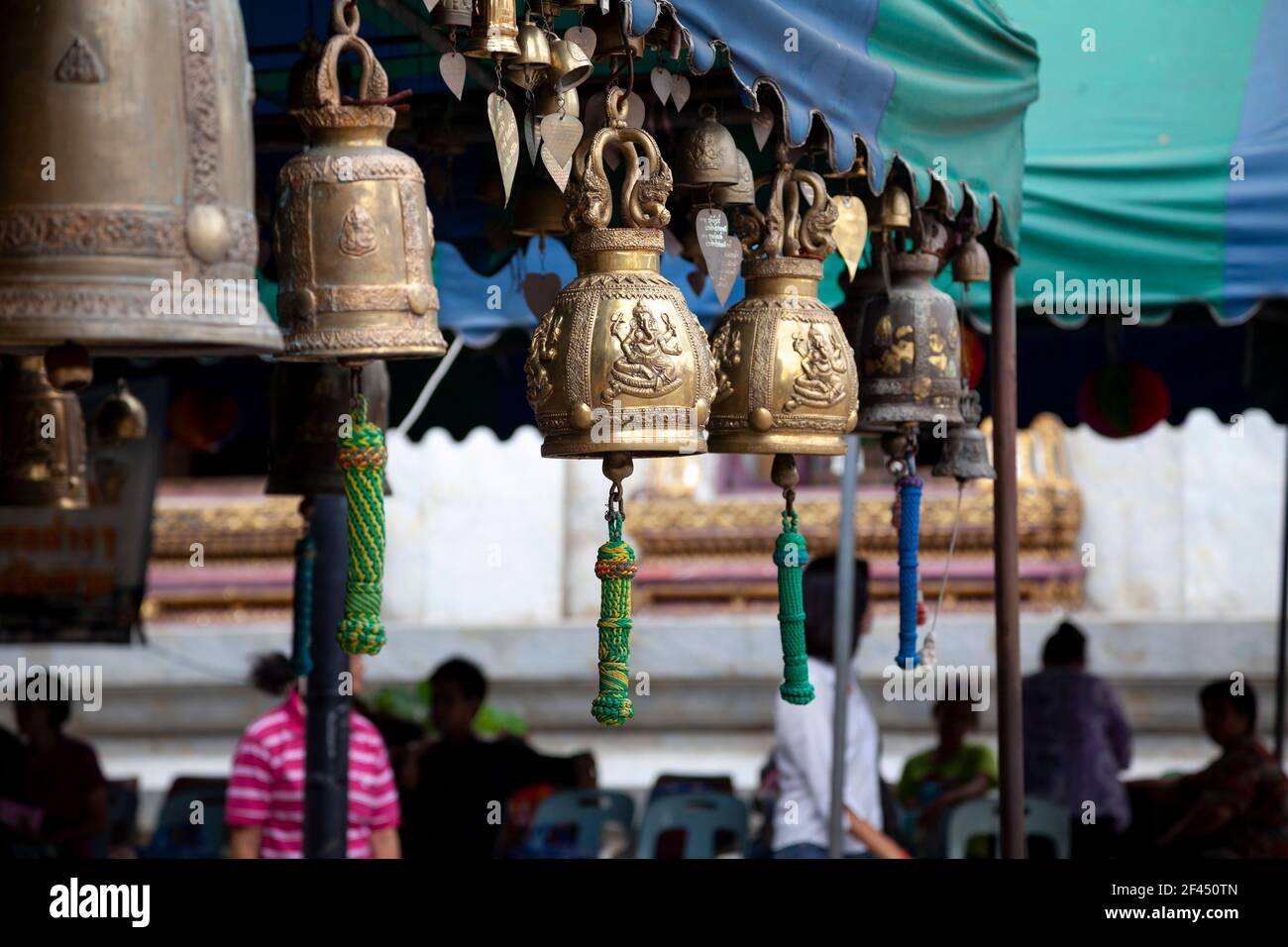 A close up view of bells at the temple complex of Wat Rakhang in ...